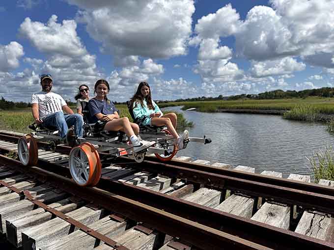 Pedaling through paradise with your crew, where marshland views make the workout totally worth it.