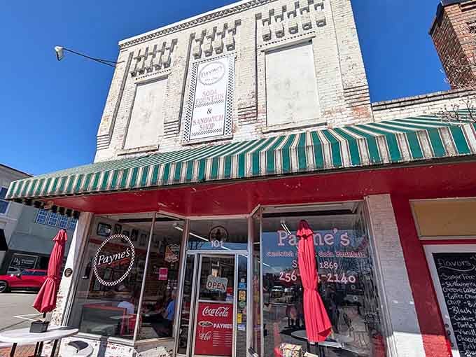 That striped awning and red storefront aren't trying to be retro, they just never bothered leaving the fifties.