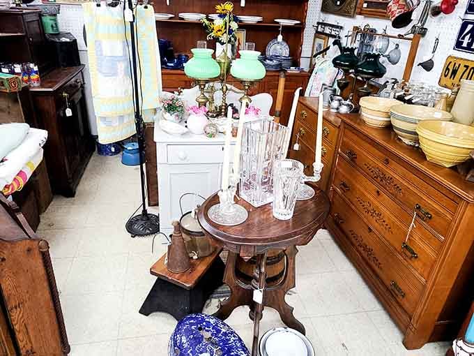 Vintage treasures arranged like a museum display where everything's actually for sale and touchable.