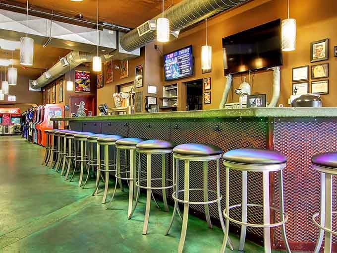 That bright bar and those chrome stools are calling your name louder than a Pac-Man power pellet.