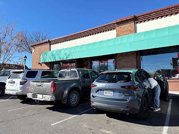 That turquoise awning isn't just decoration, it's a homing beacon for anyone who appreciates seriously good breakfast.