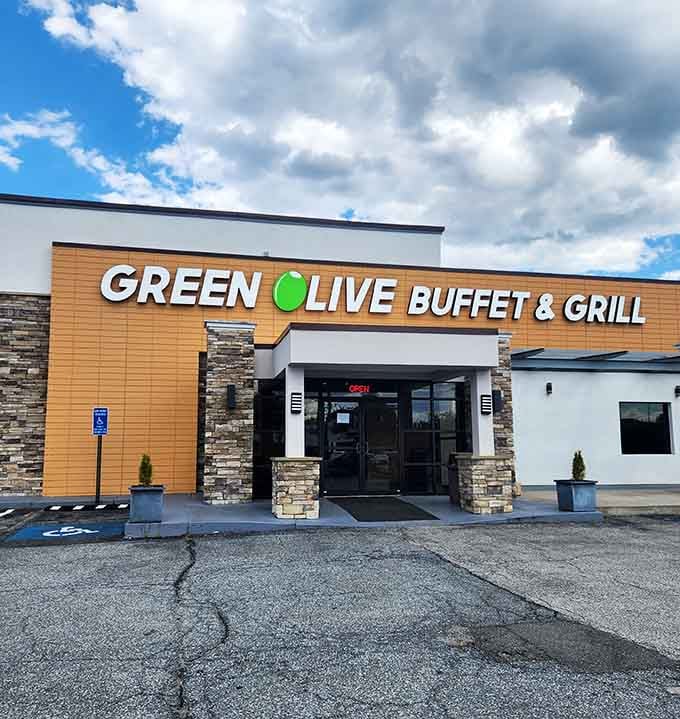 That modern exterior with stone accents promises something special waiting inside for your hungry soul.