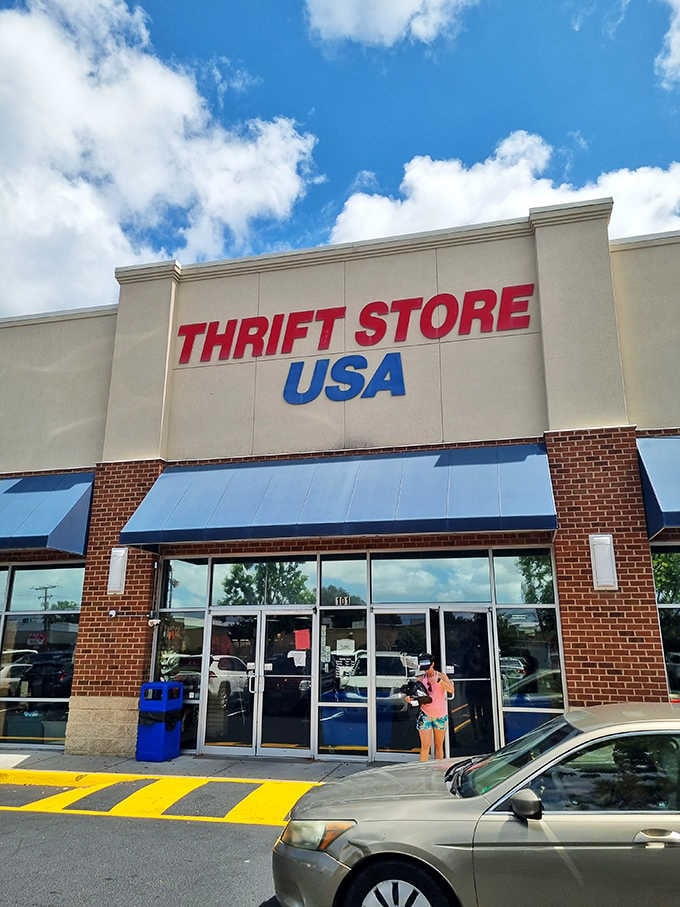 That blue sky and bold red-and-blue sign promise treasure hunting under perfect conditions for bargain seekers.