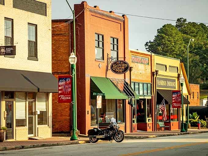 Downtown Toccoa serves up colorful storefronts and that classic motorcycle parked like it owns the place perfectly.