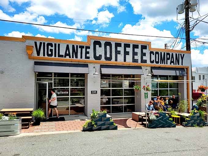 That bold orange and white sign against the blue sky practically shouts "great coffee lives here!"