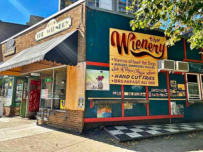 That colorful storefront practically shouts "come get a hot dog!" with hand-cut fries and breakfast all day long.