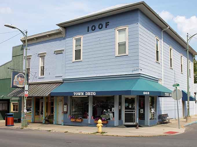 That classic corner drugstore with the IOOF hall above proves small-town charm never goes out of style.