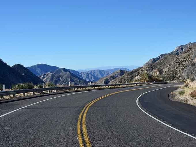 Sweeping curves reveal layer upon layer of peaks, each ridge a reminder of California's endless beauty.