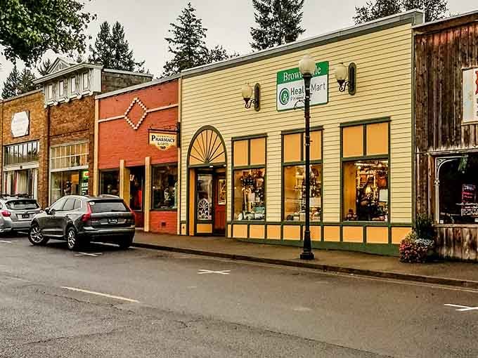 Colorful storefronts line the sidewalk where history meets modern small-town charm every single day.