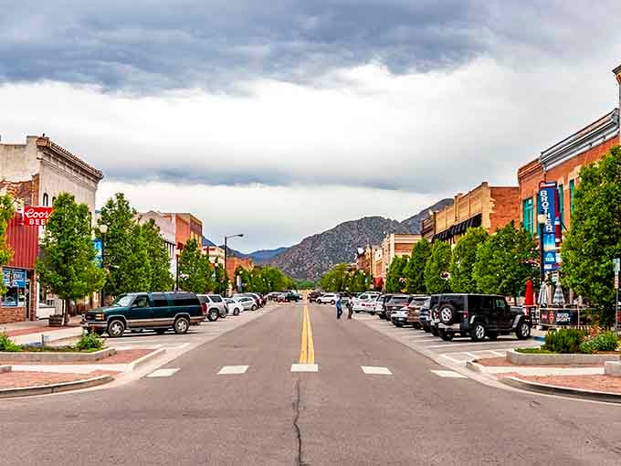 Storm clouds gather over downtown streets where every building tells a story older than your favorite Western movie.