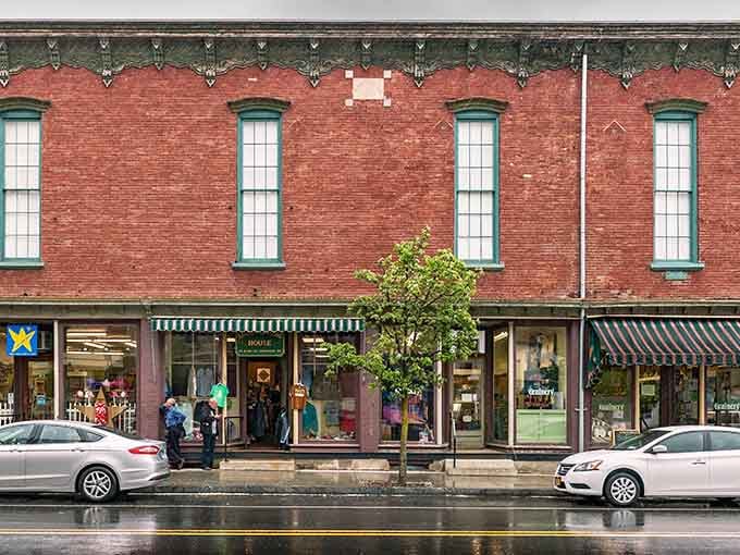 Those ornate window frames and striped awnings prove small-town charm never goes out of style, friends.