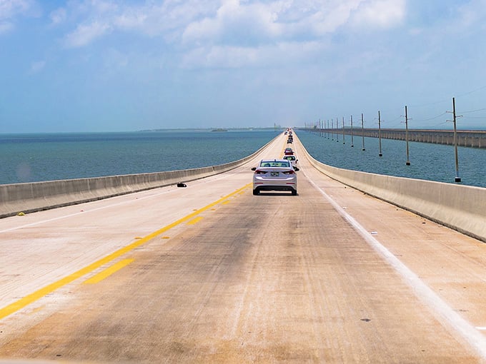 The road rises like a ribbon across the sea, making you feel like you're flying over the Atlantic.
