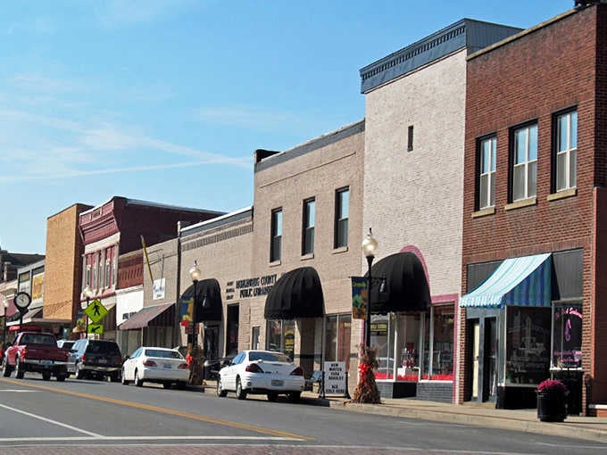 Classic storefronts with their charming awnings line the street, inviting you to slow down and savor small-town life.