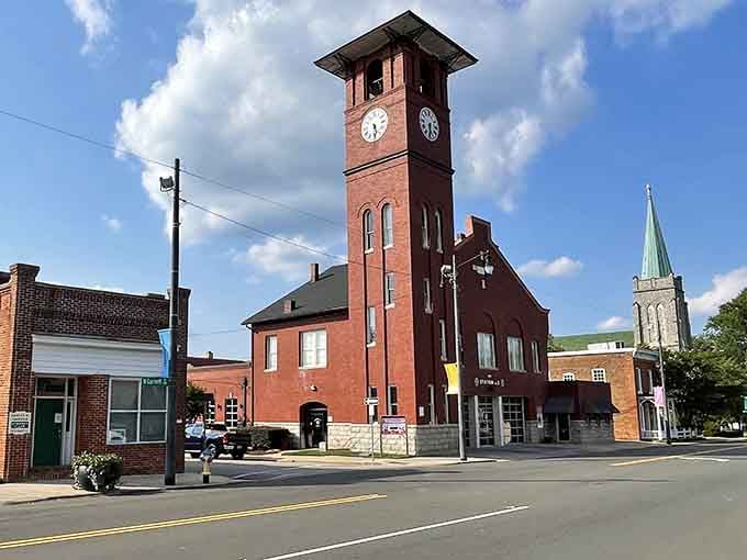 That brick clock tower stands proud like a town guardian, marking time in a place where nobody's rushing.