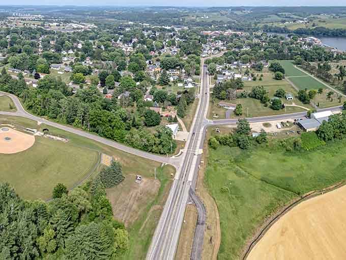 That main road cutting through town is your gateway to brick buildings and genuine small-town American charm.