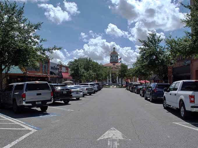 Downtown streets framed by historic buildings and puffy clouds remind you why small-town Florida still has magic.