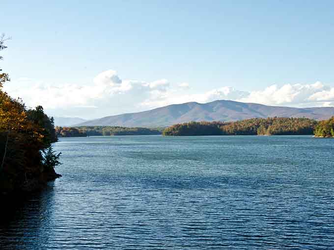 Lake James stretches out beneath those Blue Ridge peaks, proving paradise doesn't require a passport.