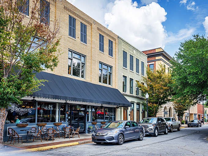 Sidewalk cafes and tree-lined streets create the perfect backdrop for affordable small-town living at its finest.