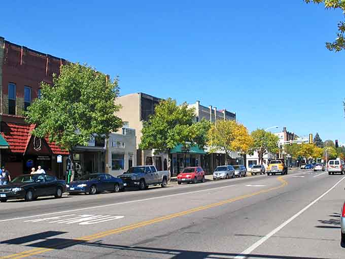 Golden autumn trees frame a Main Street that looks like it stepped out of a Norman Rockwell painting.