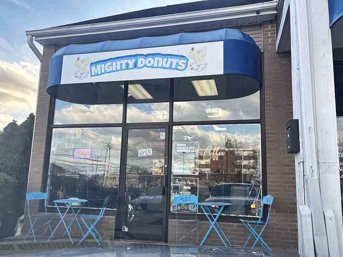 When the "OPEN" sign glows at this modern storefront, happiness is just one glazed donut away.