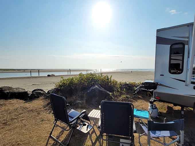 Your camp chairs face endless beach while the sun warms the sand&mdash;pure coastal bliss awaits.
