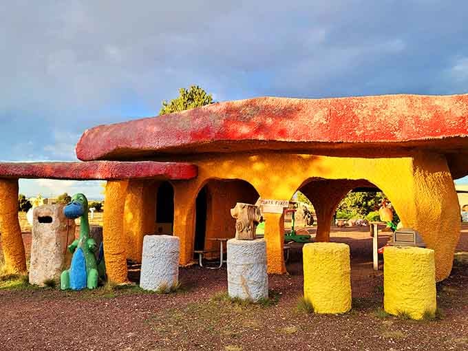 The Flintstones called and want their neighborhood back, complete with bright orange roofs and prehistoric charm galore.