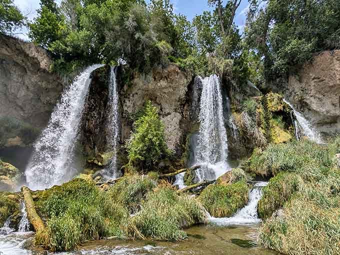 Three limestone waterfalls cascade side by side like nature's own fountain show, minus the Vegas ticket prices.