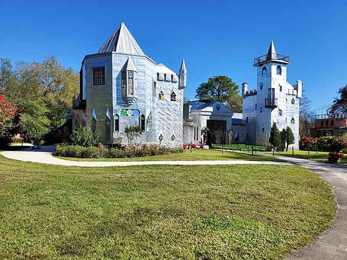 Turrets and towers gleam under blue skies, proving one person's imagination can build something truly extraordinary.