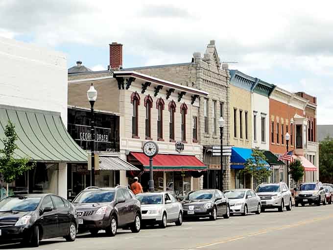 Timeless beauty meets small-town hustle where jewelry glitters behind glass and that classic street clock keeps everyone on schedule.