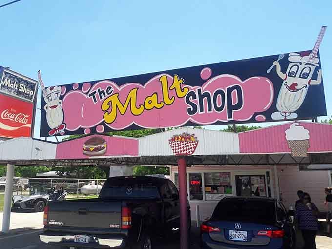 That cheerful mascot promises thick shakes and good times at this bubblegum-pink roadside treasure.