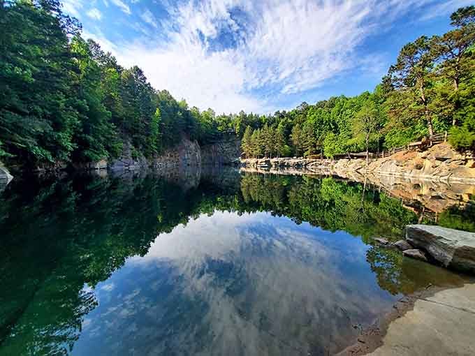 When the sky mirrors perfectly in still quarry water, you've found nature's own infinity pool right here.
