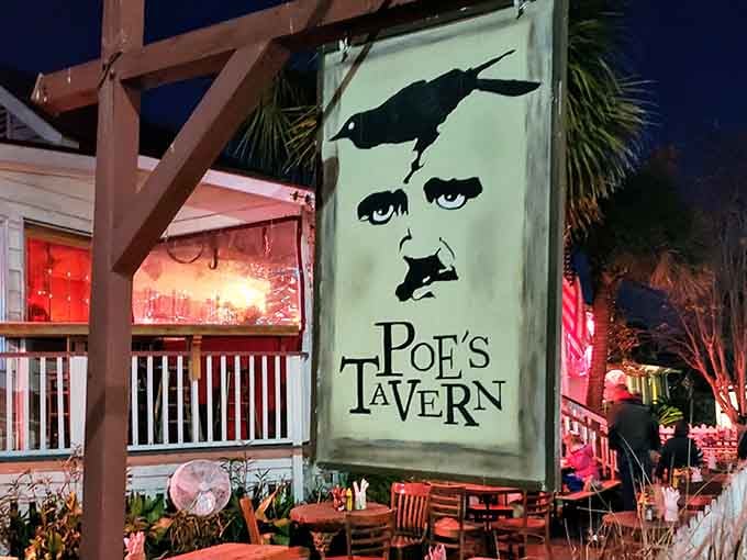 Evening transforms the tavern into something magical, where literary darkness meets coastal charm under twinkling lights.