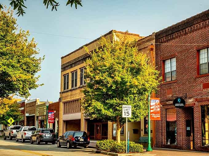 Golden hour bathes these historic brick buildings in warm light, making every architectural detail shine beautifully.