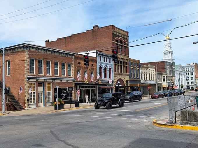 Classic brick buildings and American flags create a Main Street that Norman Rockwell would've loved painting.