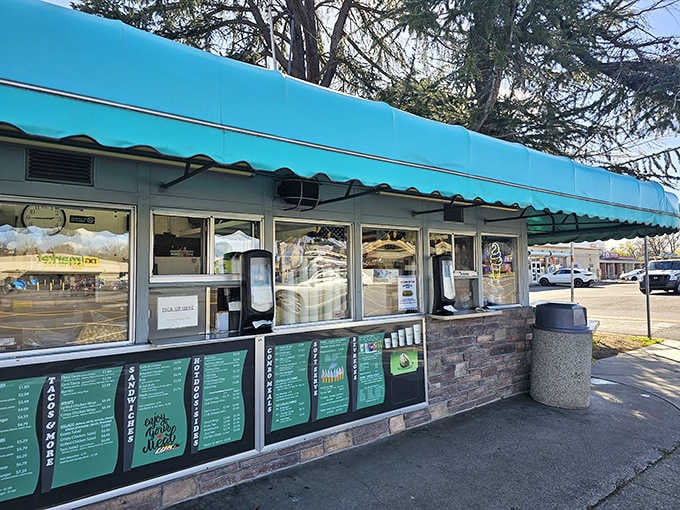 That turquoise awning has been shading burger dreams for over half a century, and it shows no signs of retiring.