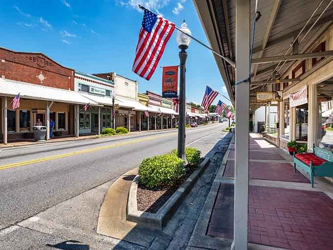 Covered sidewalks offer shade for leisurely strolls through a downtown that rewards slow exploration.