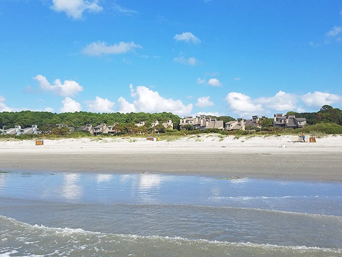 Sky meets sand meets water in the kind of reflection that makes amateur photographers feel like Ansel Adams.