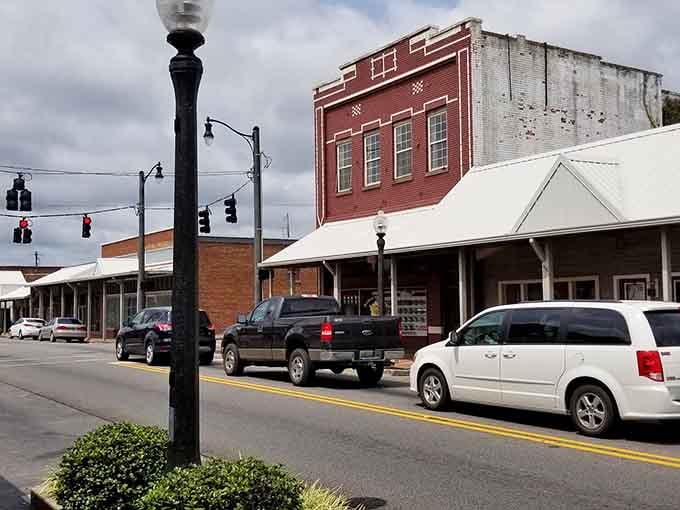 Historic buildings stand proud, their brick facades weathered by time but strengthened by community care.