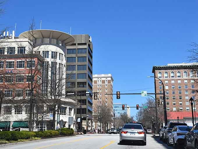 Downtown Greenville's skyline rises against Carolina blue skies, looking surprisingly cosmopolitan for a city that still says "y'all."
