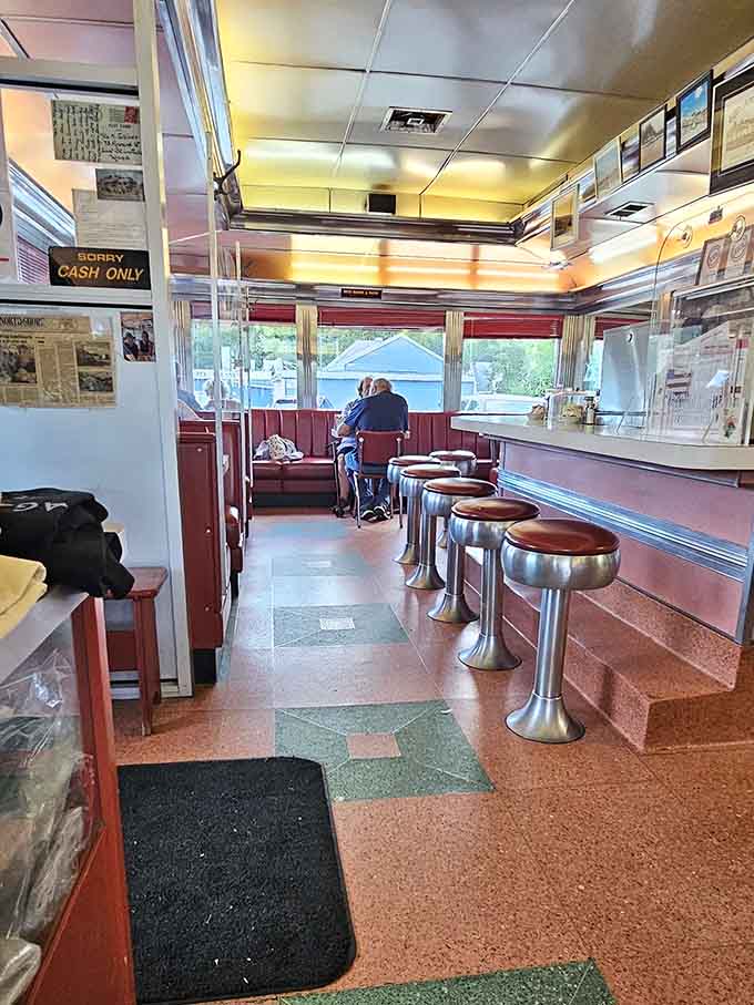 Classic counter stools and cozy booths create the perfect diner atmosphere for serious eating.