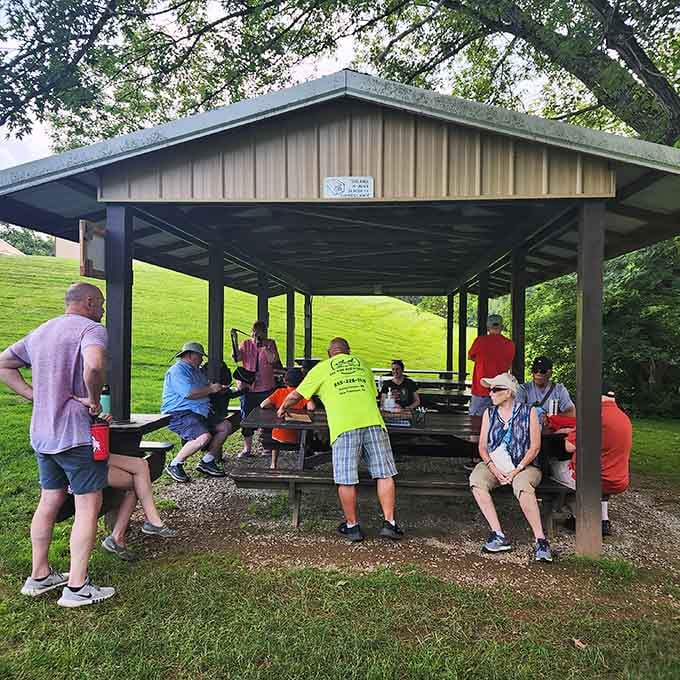 The pre-ride gathering spot where strangers become friends and everyone's excited about what lies ahead on the rails.