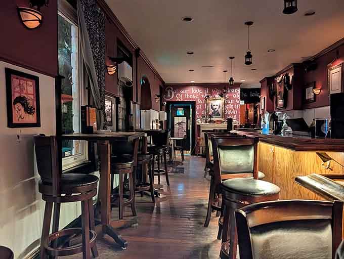 Deep burgundy walls and dark wood create an atmosphere where Poe himself would feel right at home.