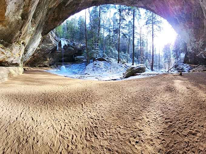 Winter transforms Ash Cave into a frozen cathedral where even your breath seems to echo with reverence.