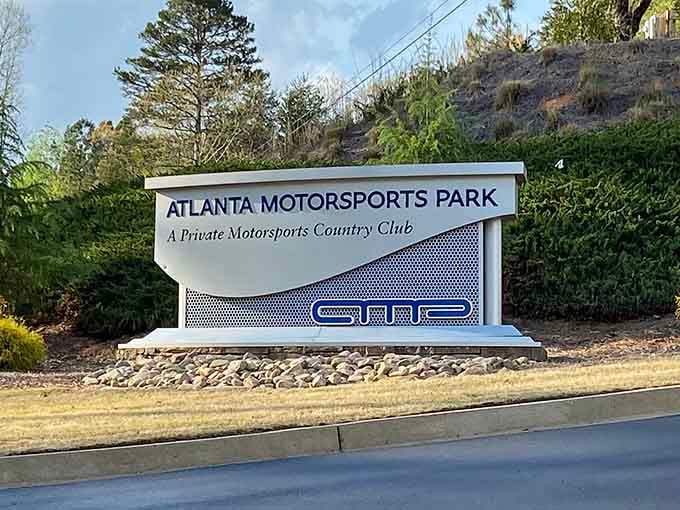This elegant entrance sign promises the kind of sophisticated speed that makes your heart race before you even start.