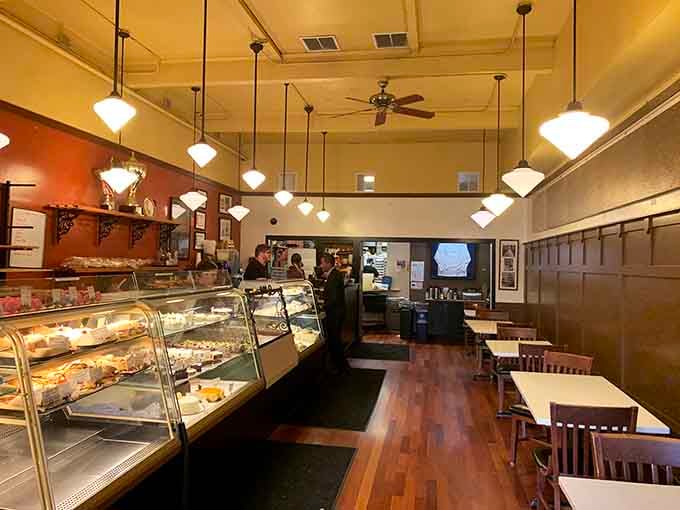 Those pendant lights illuminate more than pastries; they're spotlighting your next moment of pure, unapologetic indulgence.