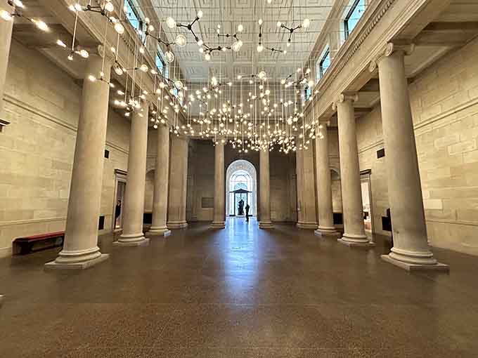 Those columns and cascading lights create an atmosphere that's both grand and surprisingly welcoming to everyone.