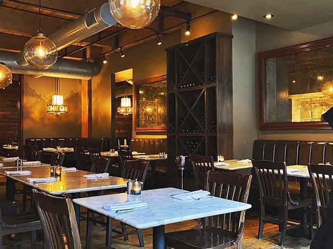 Those marble tables and warm lighting create an atmosphere where every meal feels like a celebration worth remembering.