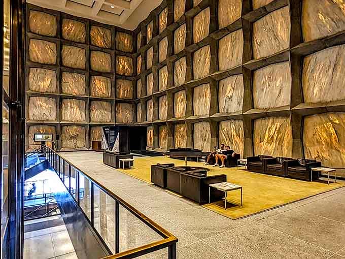 Those translucent marble walls glow like a fancy nightlight for grown-ups who never outgrew their love of reading.