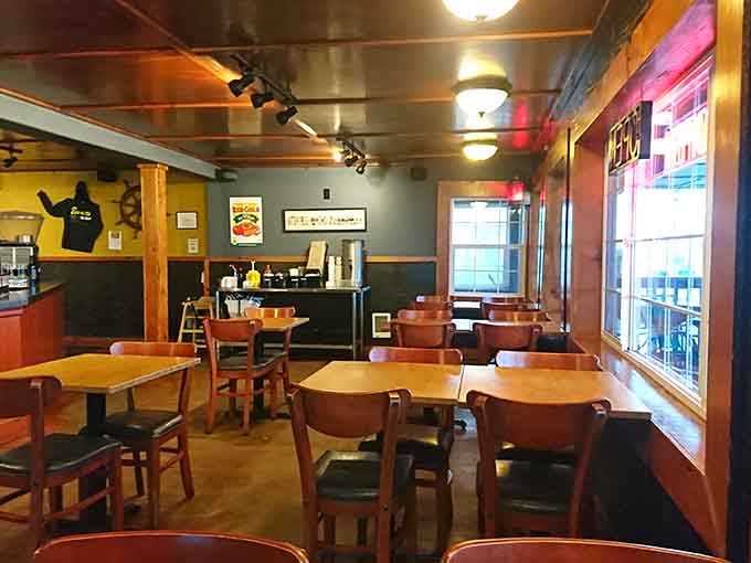 Simple wooden tables and warm lighting create the perfect stage for what's about to be your new seafood obsession.