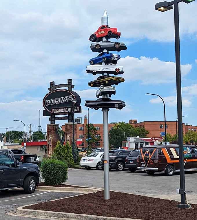 Berwyn's quirky car sculpture pays homage to the legendary Spindle, stacking automotive history toward the heavens.